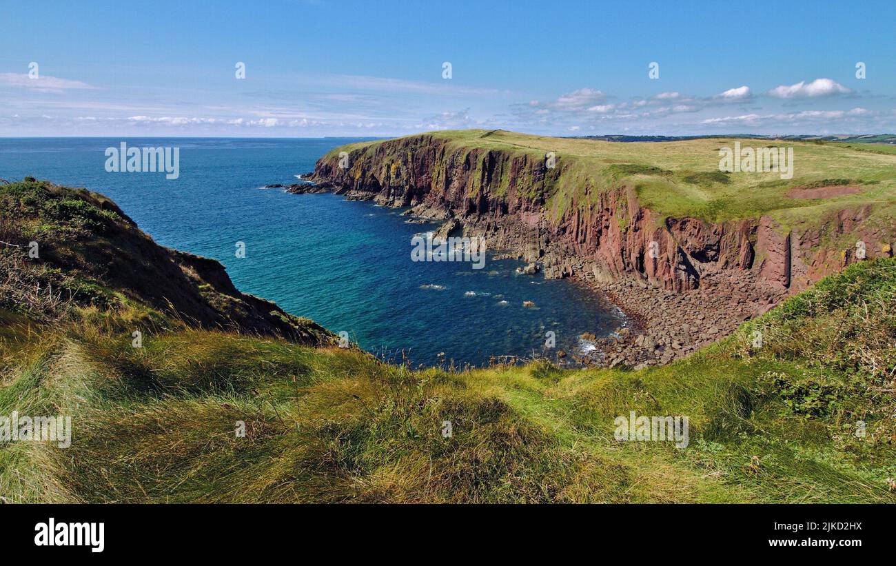 An aerial view of the bright blue Atlantic Ocean from the Welsh coast ...