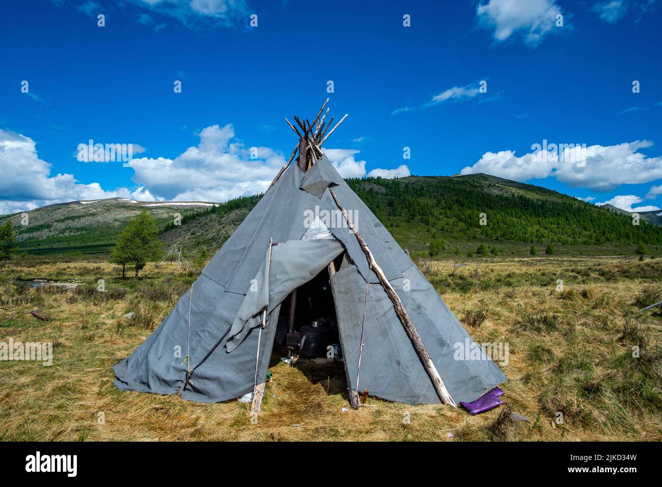 A nomadic tribe teepee on a rural field in the mountains of Northern ...
