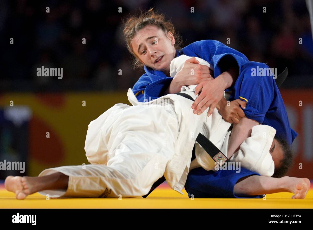 Northern Ireland’s Yasmin Javadian (blue) and Mozambique’s Jacira ...
