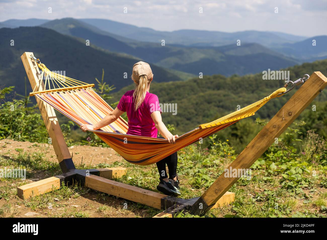 woman backpacker enjoy the view at mountain Stock Photo - Alamy