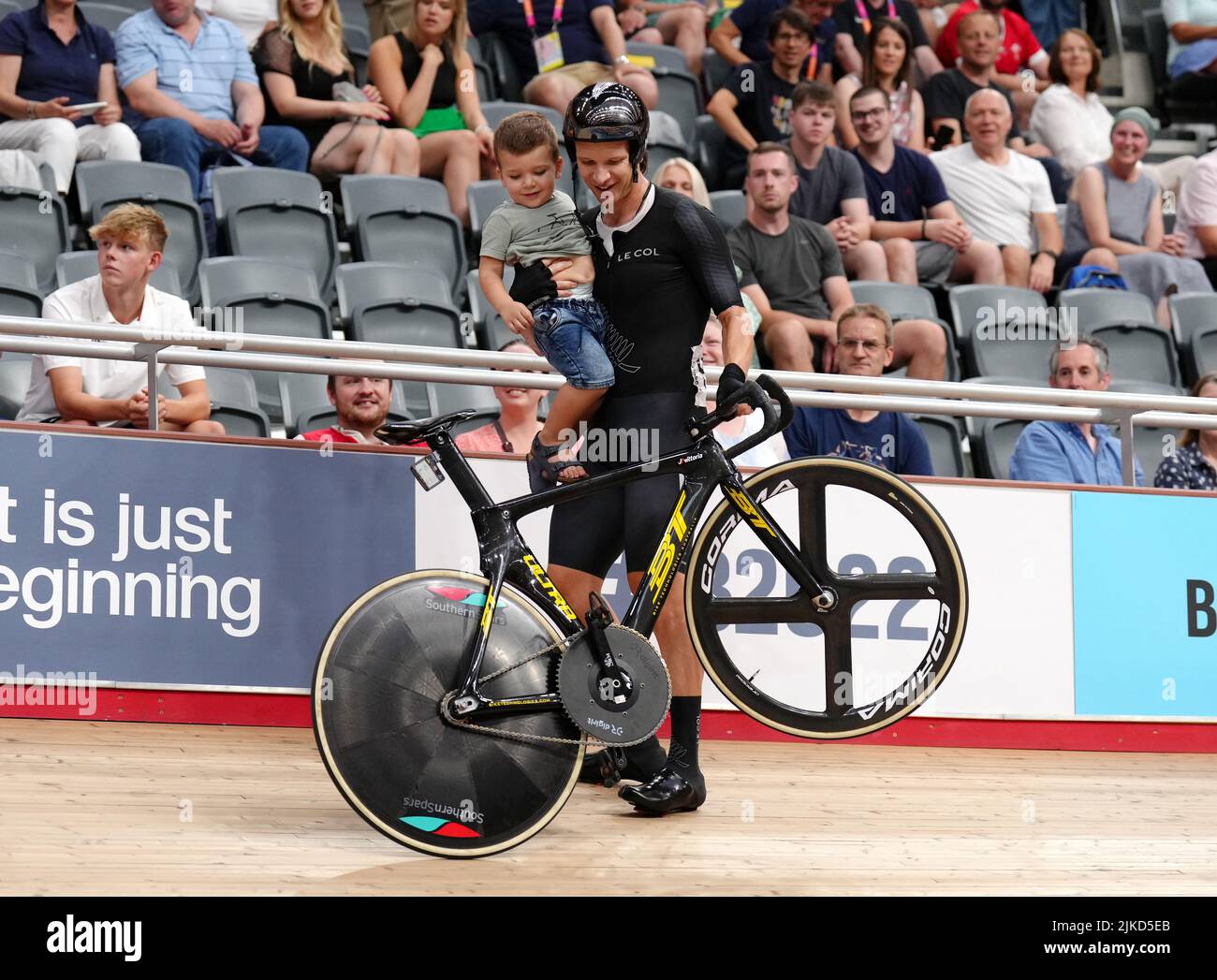 New Zealand's Aaron Gate celebrates with son Axel after winning the Men ...