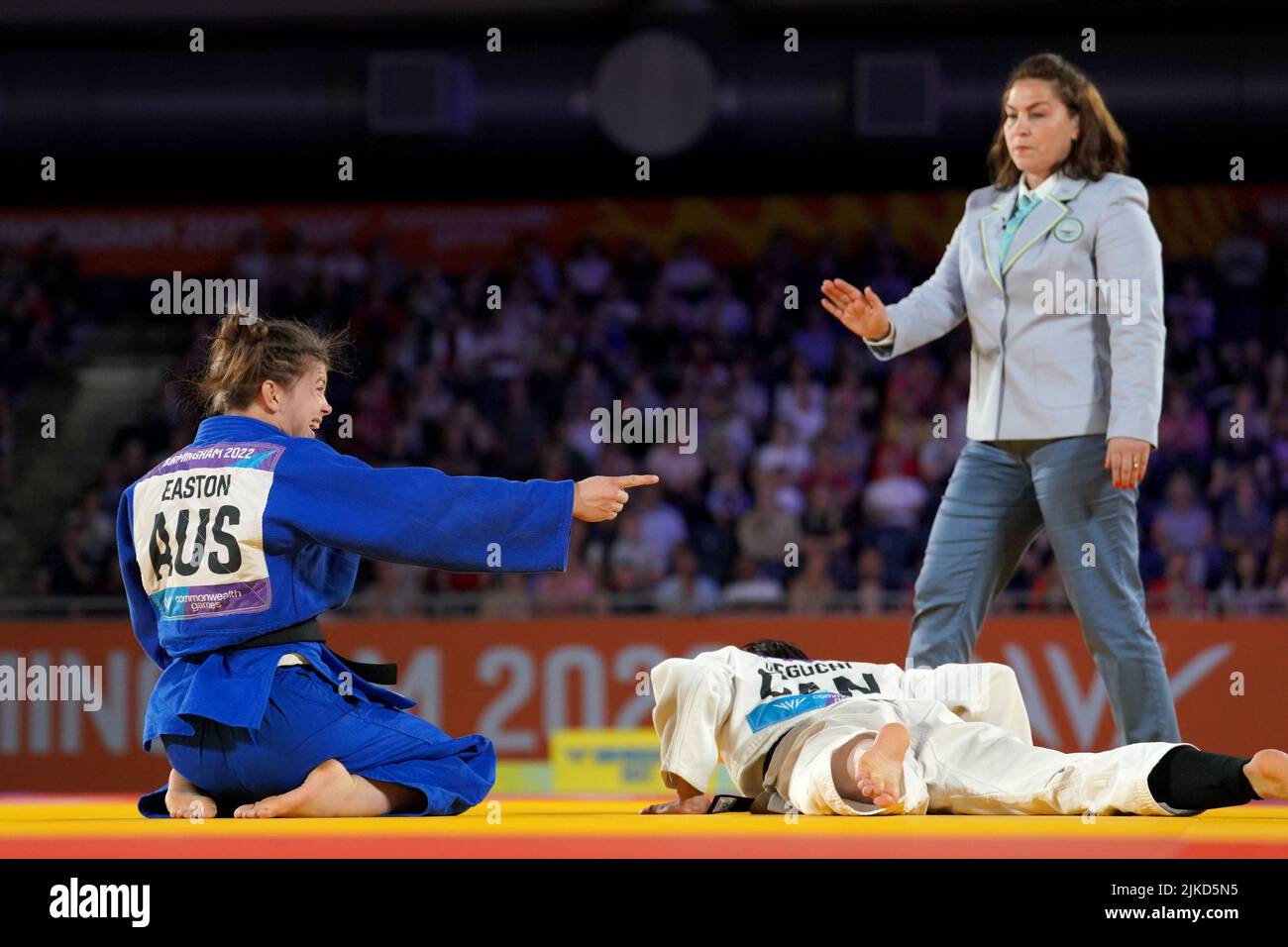 Australia’s Tinka Easton (blue) celebrates after defeating Canada’s ...