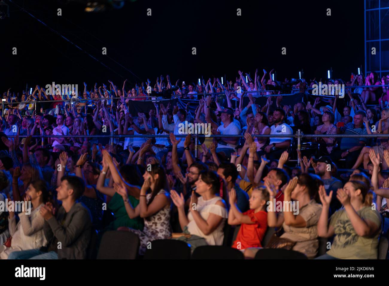 ODESSA, UKRAINE August 14, 2019: Concert 95 Kvartal. Rear view of crowd ...