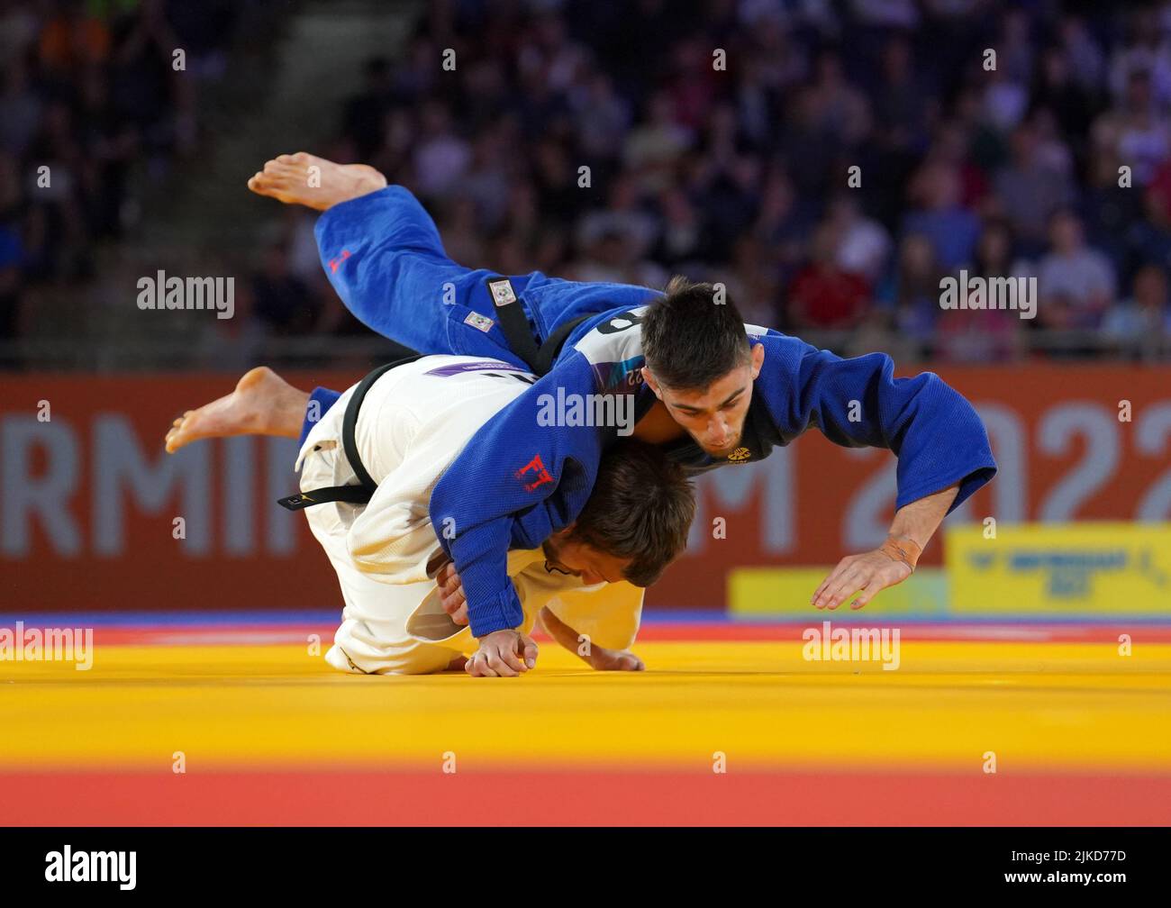 Scotland's Alexander Short (blue) and Northern Ireland's Nathon Burns ...