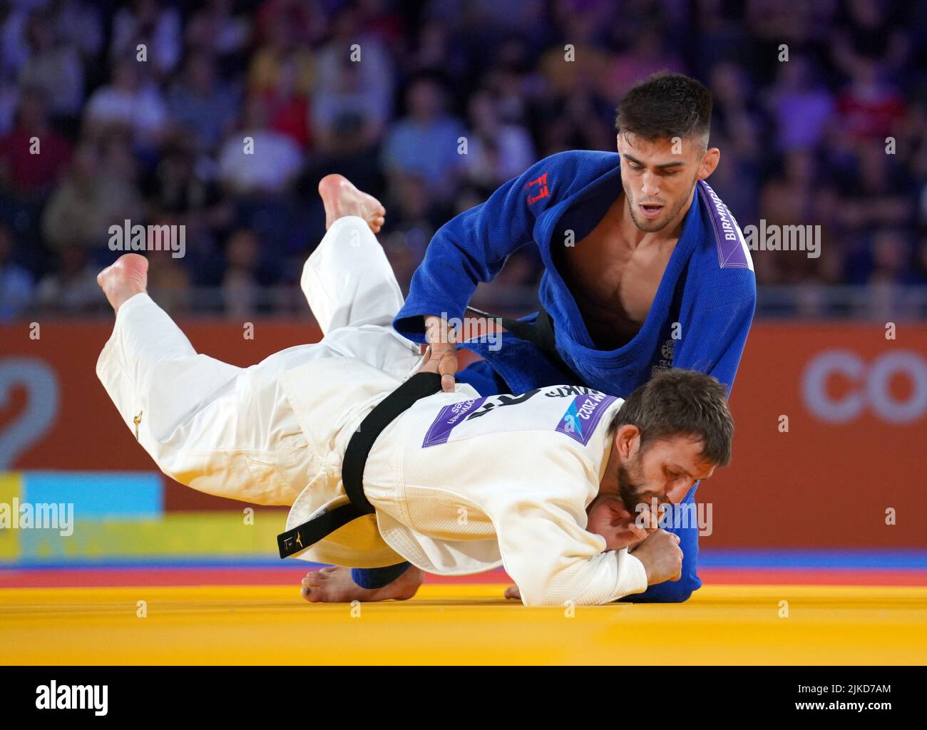 Scotland's Alexander Short (blue) and Northern Ireland's Nathon Burns ...