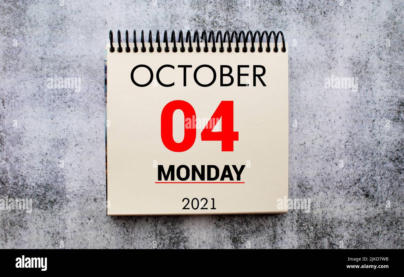 Save the Date written on a calendar - October 4 Stock Photo - Alamy