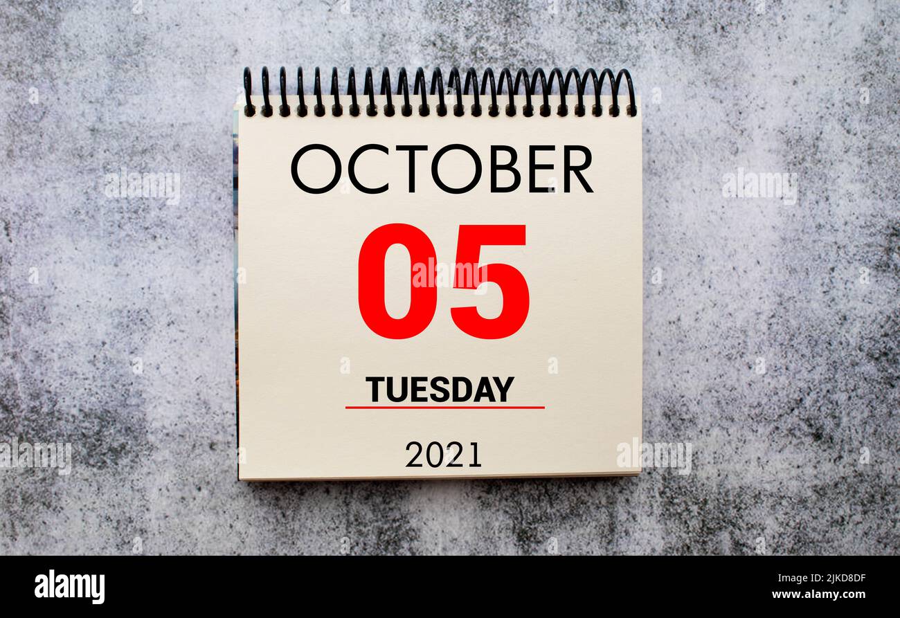 Save the Date written on a calendar - October 5 Stock Photo - Alamy