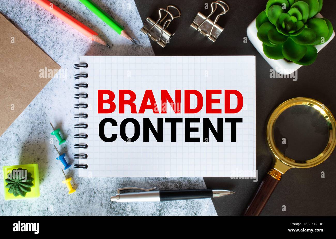 Business concept.Text Branded Content writing on notepaper with paper ...