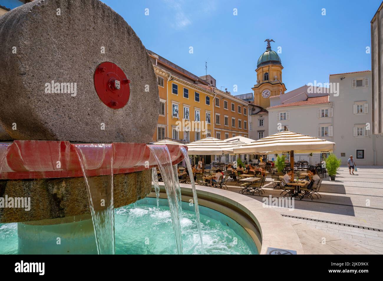 View of City Clock Tower, fountain and restaurants in Trg Ivana Koblera ...