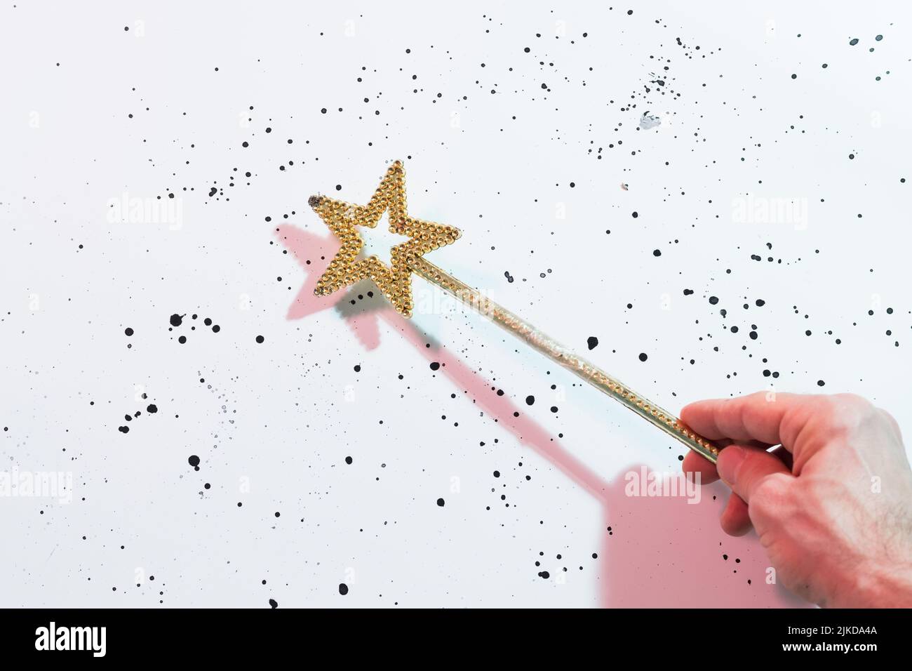 holiday magic gold magic star wand fairy Stock Photo - Alamy