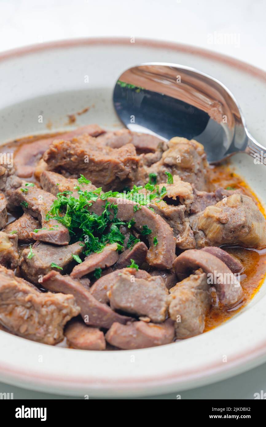 stew of meat, livers and kidneys Stock Photo - Alamy