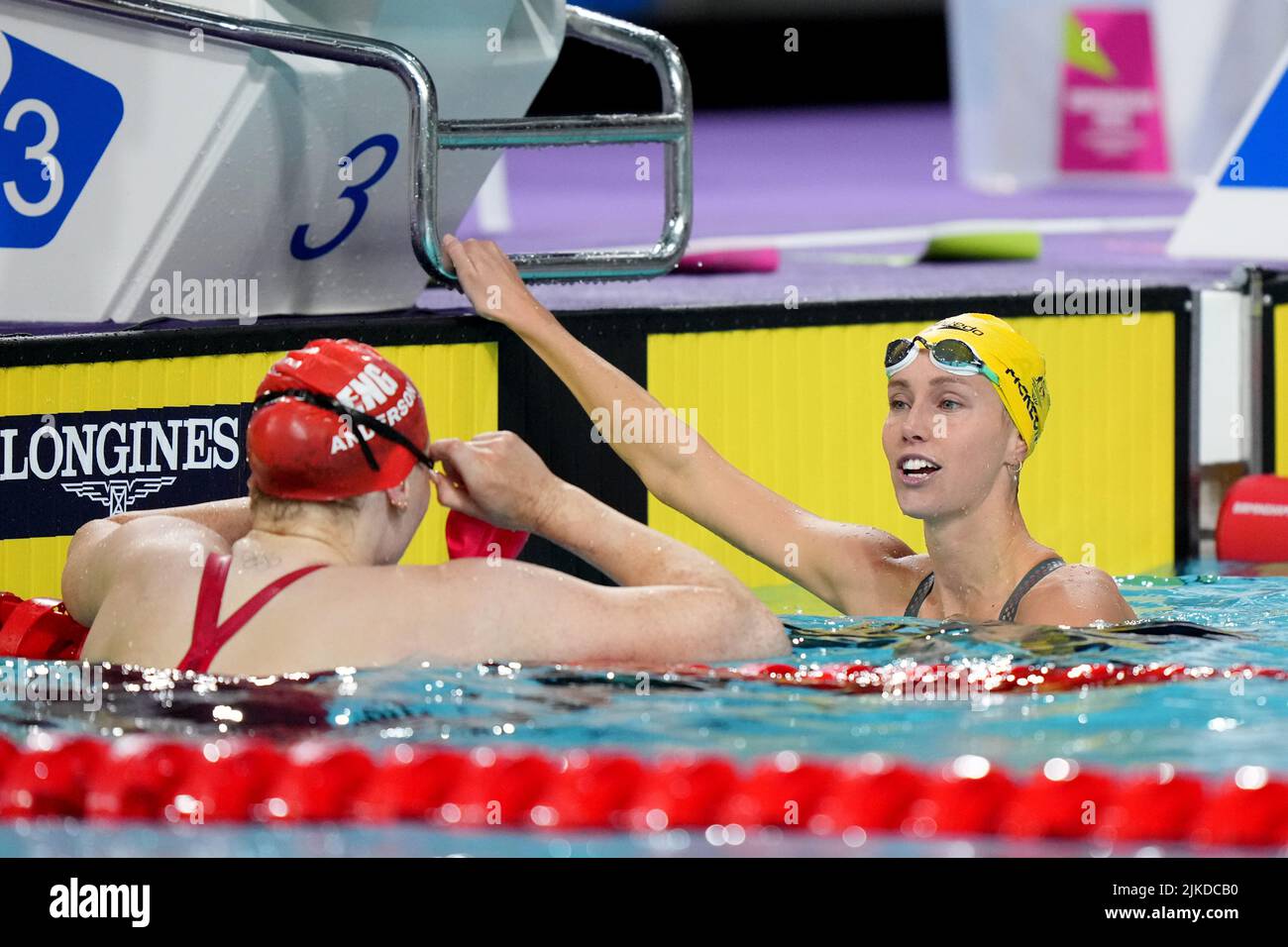 Australia’s Emma McKeon (right) interacts with England’s Freya Anderson ...