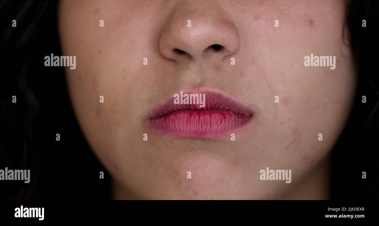 Upset hispanic girl changing emotion. Woman lips mouth becoming angry ...