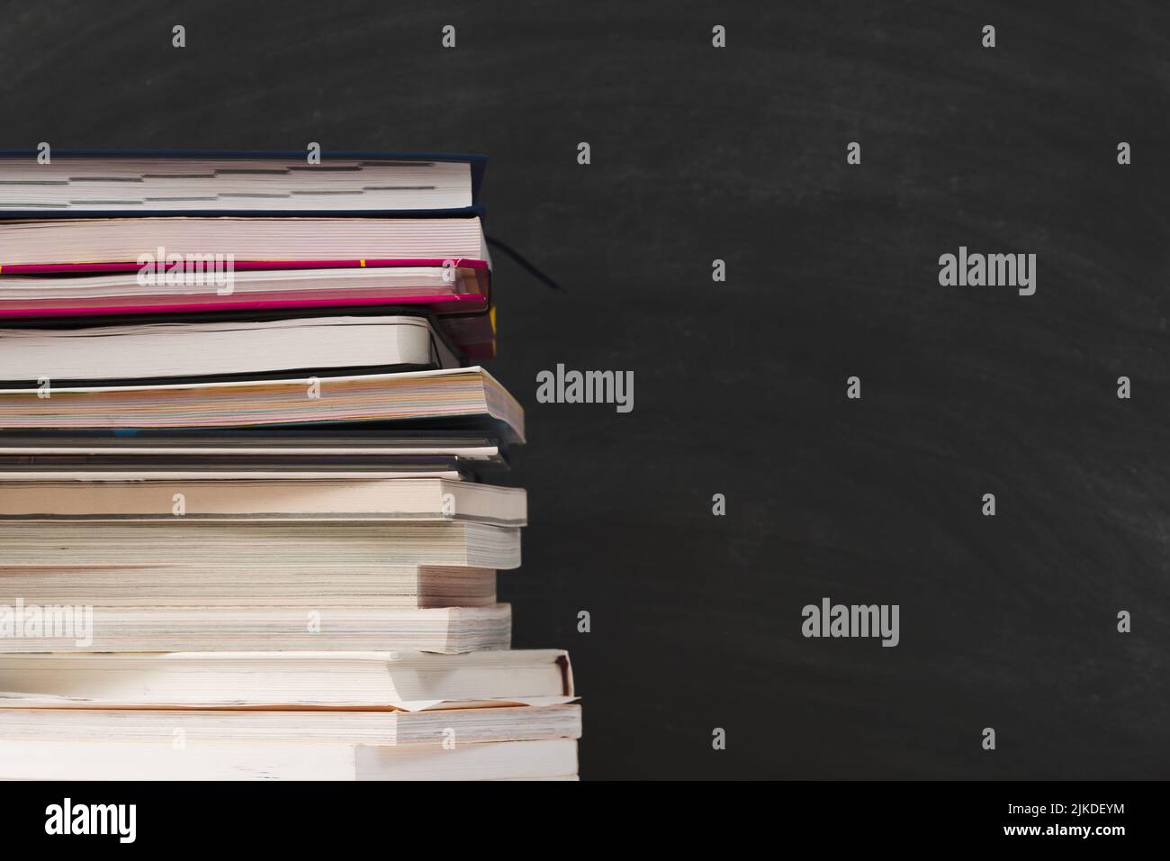 education concept book stack empty chalkboard Stock Photo - Alamy
