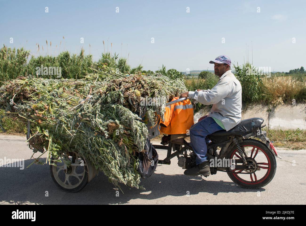 Driving a tricycle hi-res stock photography and images - Alamy