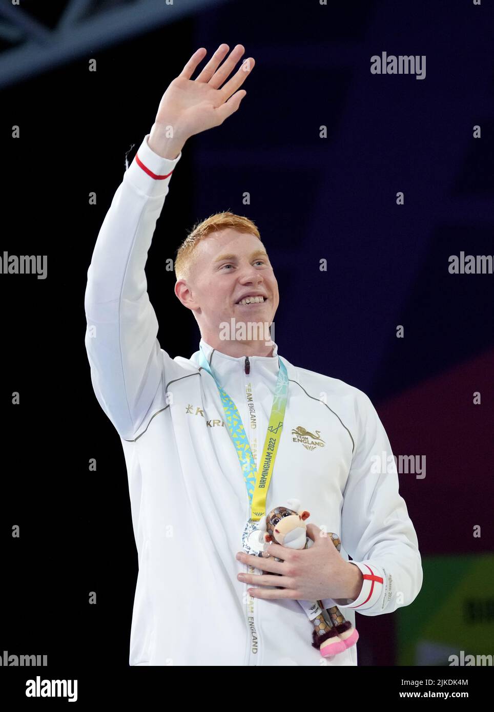 England’s Tom Dean with his Silver Medal reacts after the Men’s 100m ...