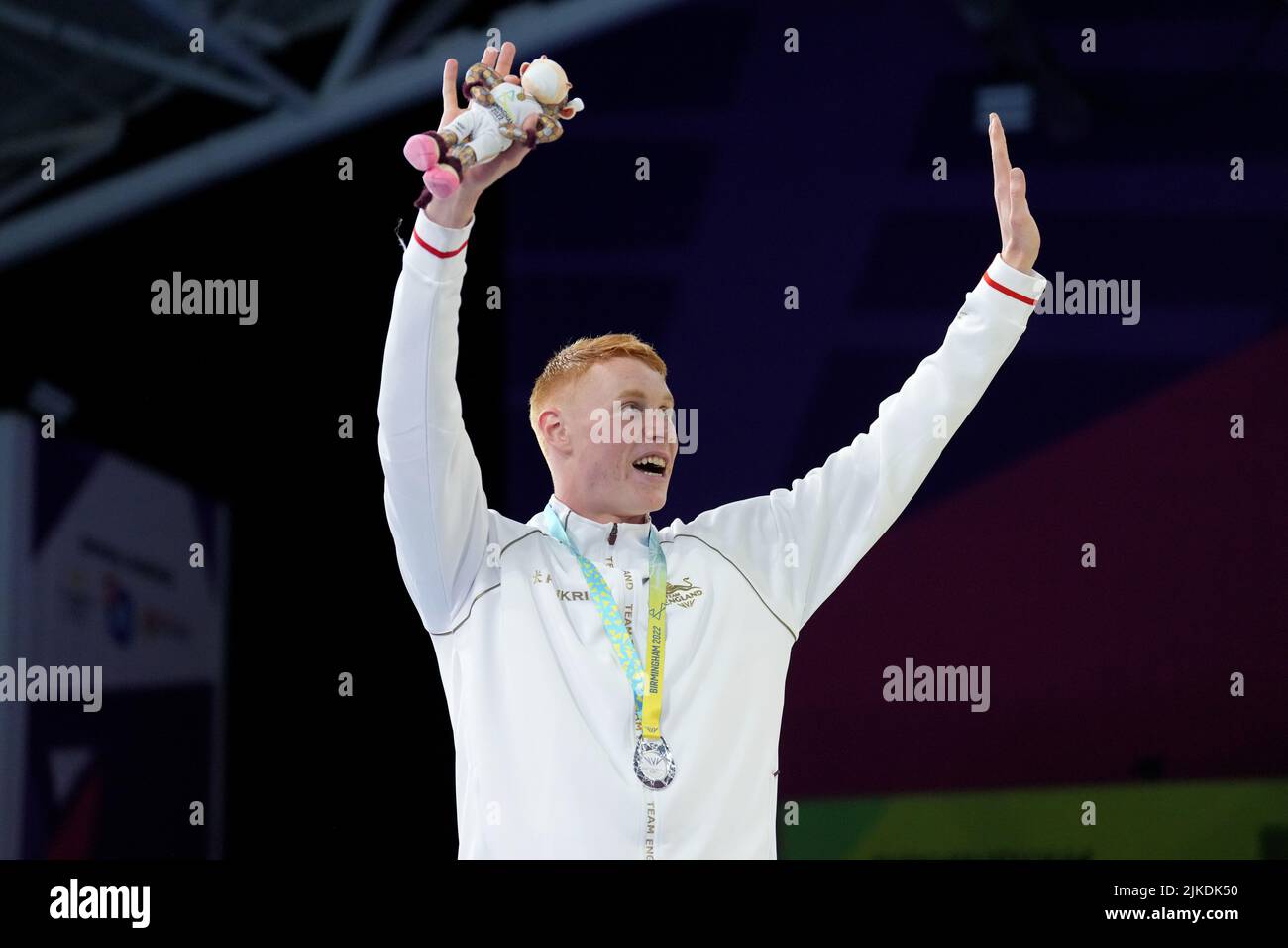 England’s Tom Dean with his Silver Medal reacts after the Men’s 100m ...