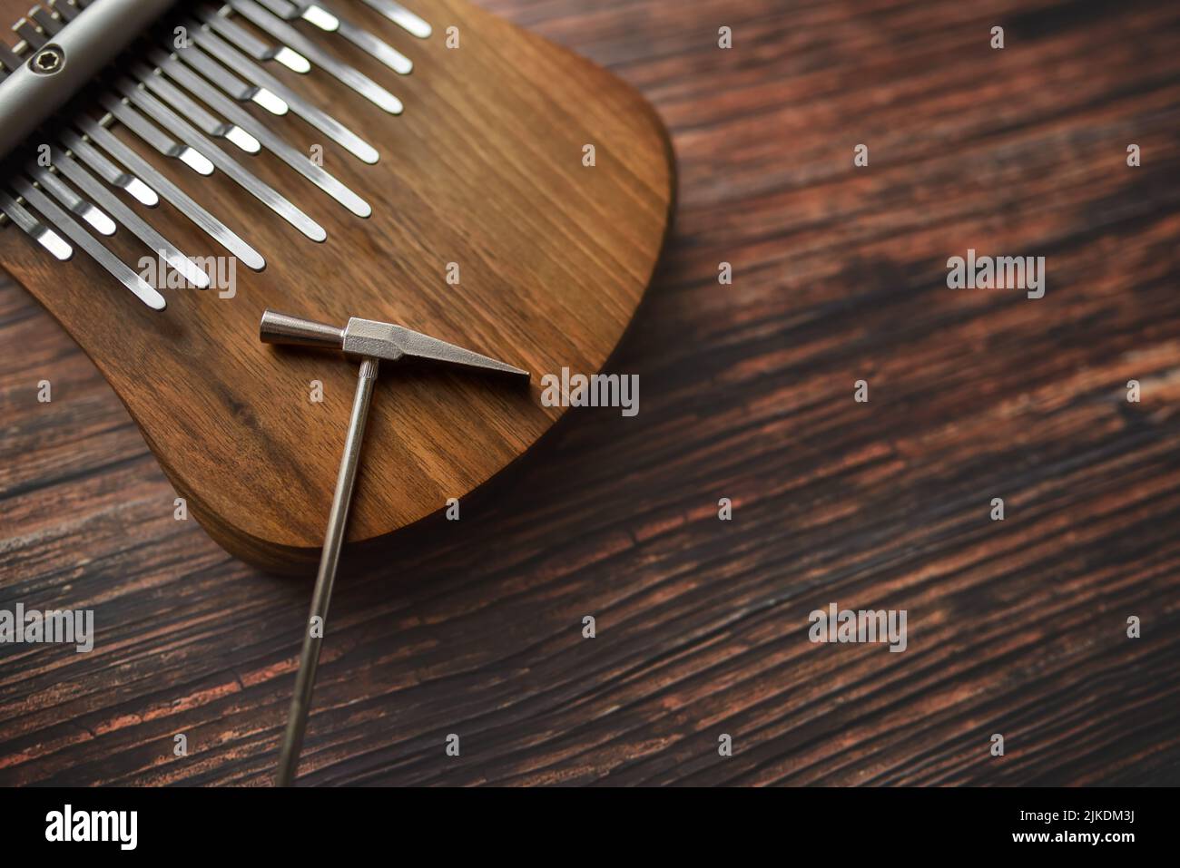 Kalimba is a musical instrument with a wooden soundboard and metal keys ...