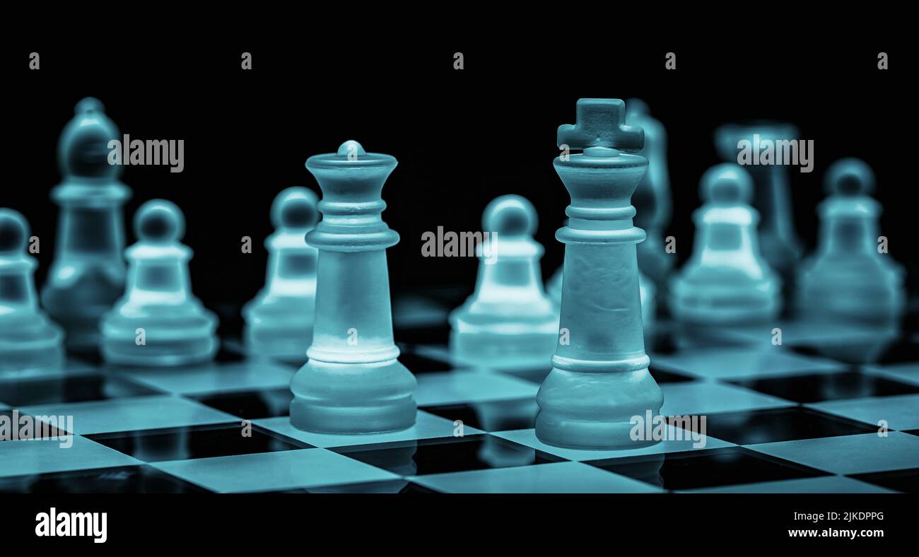 Glass chess on chess board. Close up with the black background Stock ...