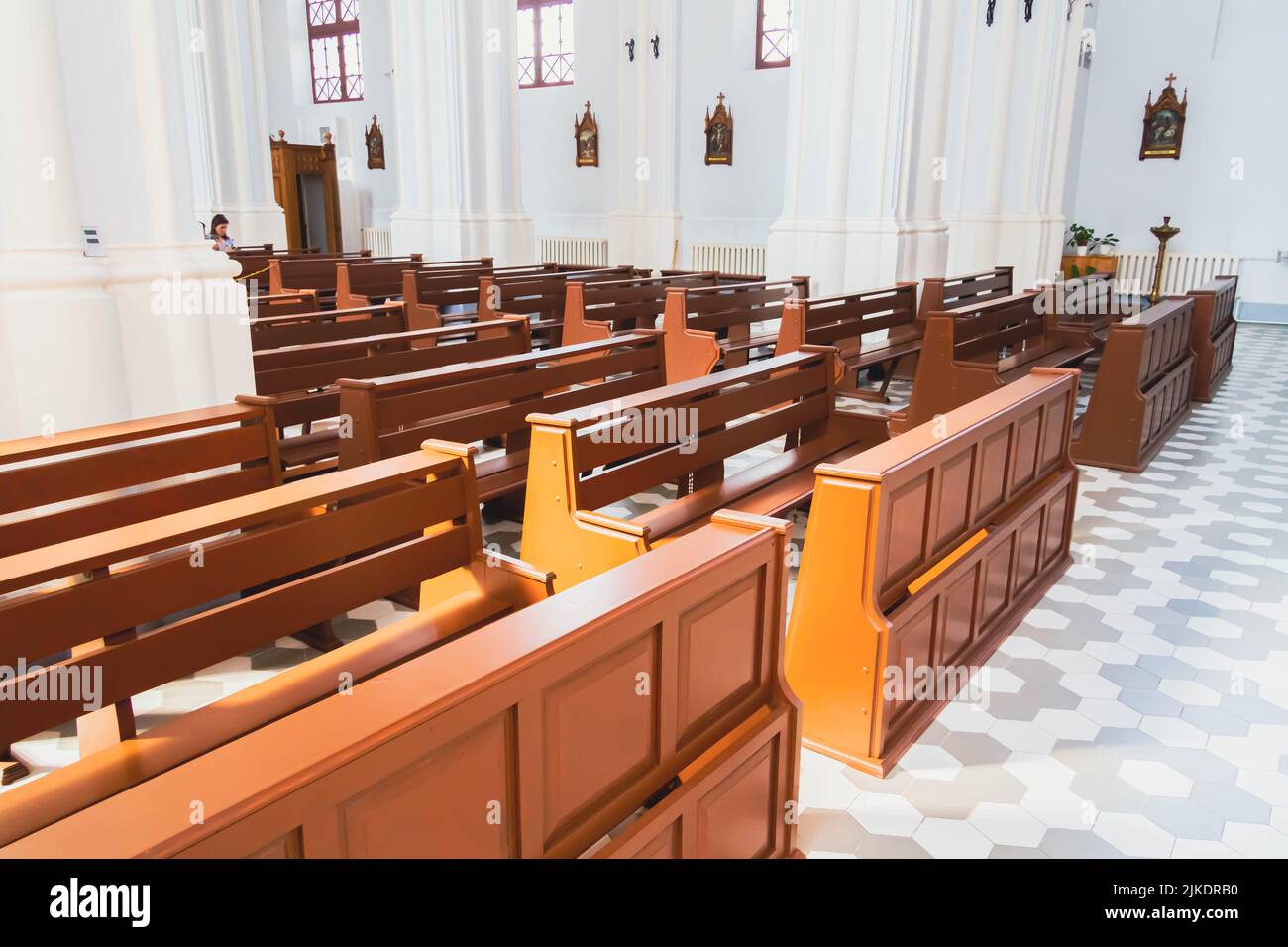 People pray in the church. Church parish. Believers sit on benches in ...