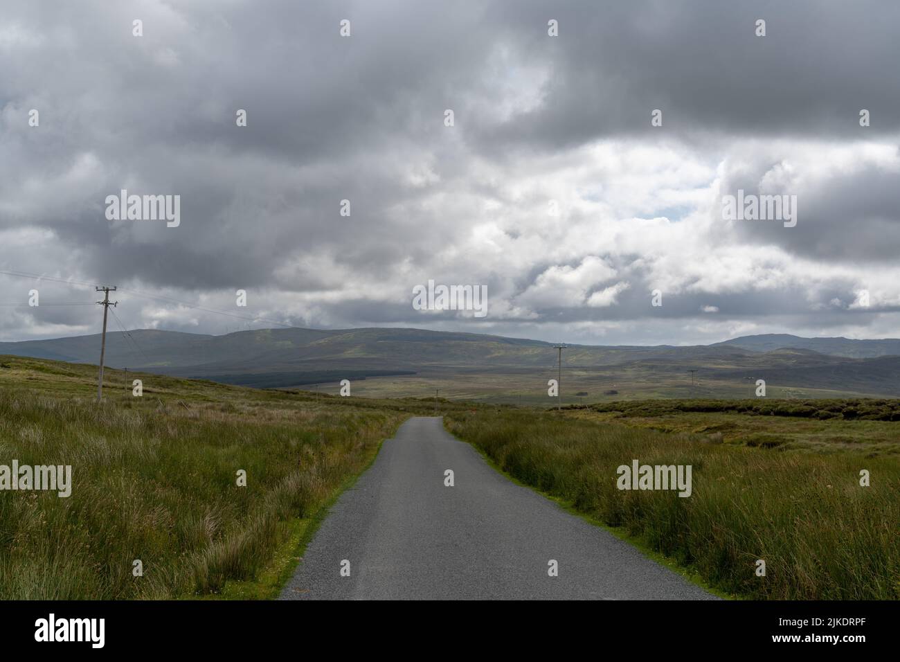 landscape view in County Donegal under an overcast sky with a small ...