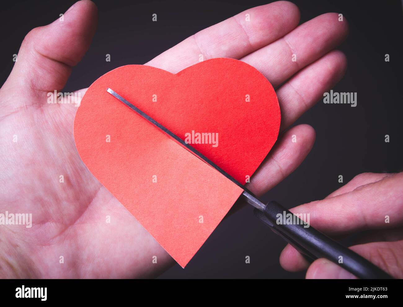 Broken heart. Divorce of a married couple. Broken marriage. Heart in ...