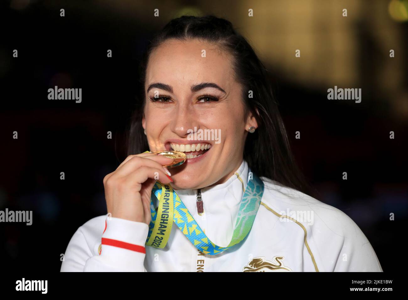England’s Sarah Davies poses with her gold medal after winning in the ...