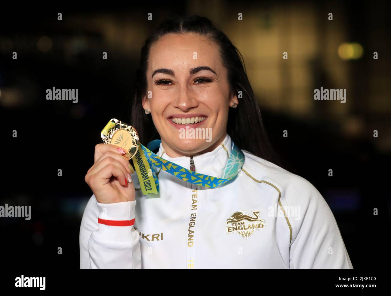 England’s Sarah Davies poses with her gold medal after winning in the ...