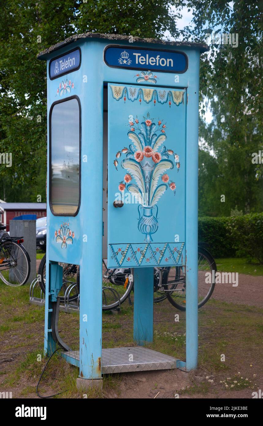 Telephone box painted in a typical Dalarna style Stock Photo - Alamy