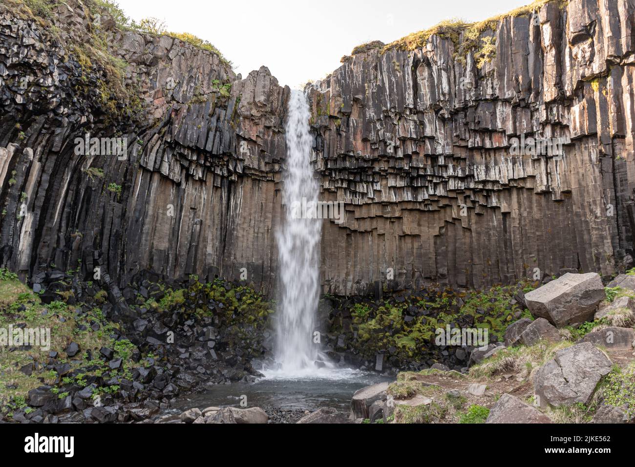 Svartifoss waterfall in Skaftafell National Park in Iceland, surrounded ...