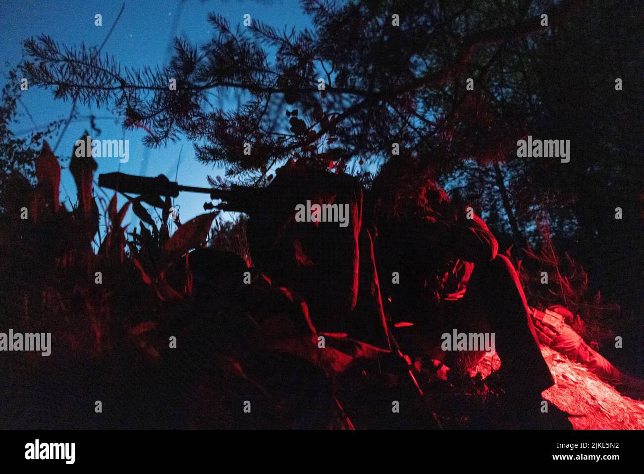 220615-Z-JY390-004 An Italian Special Forces Sniper team prepares to ...