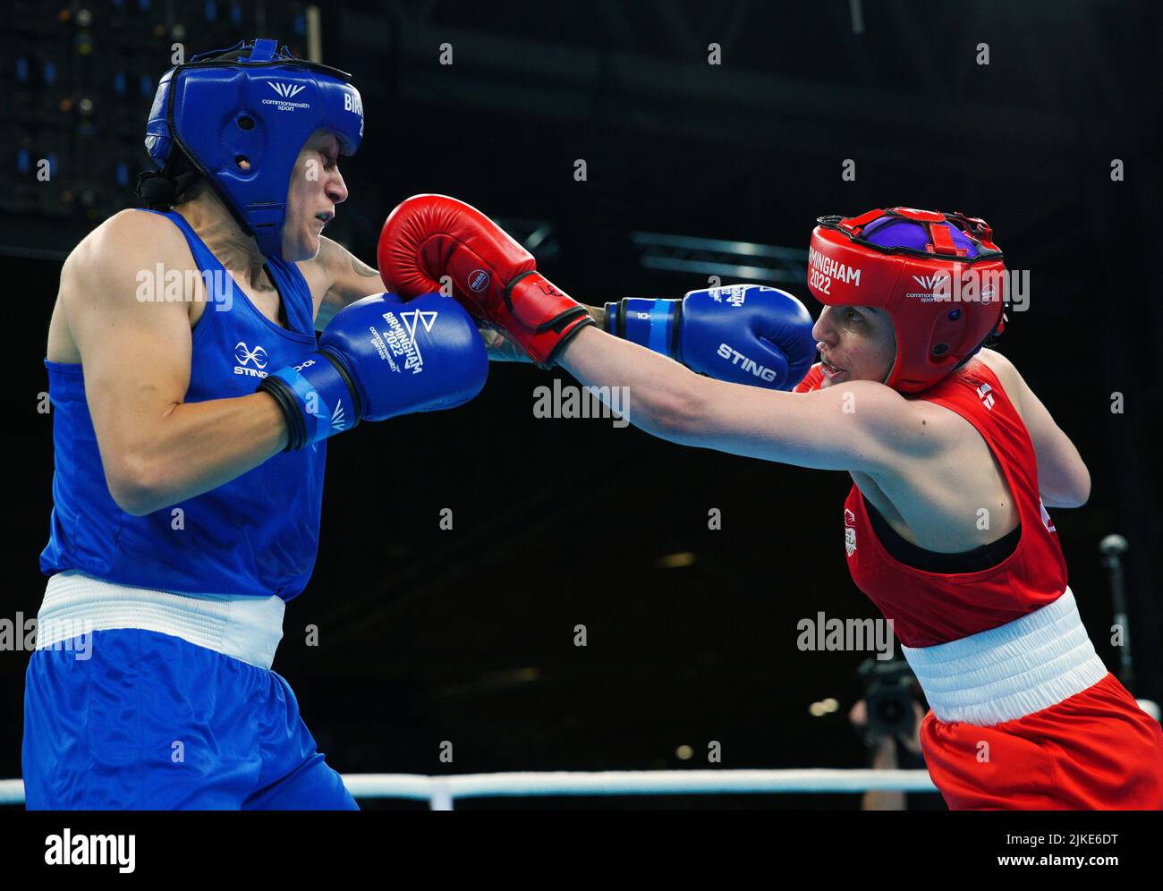 England's Gemma Paige Richardson (red) and Scotland's Megan Reid in the ...