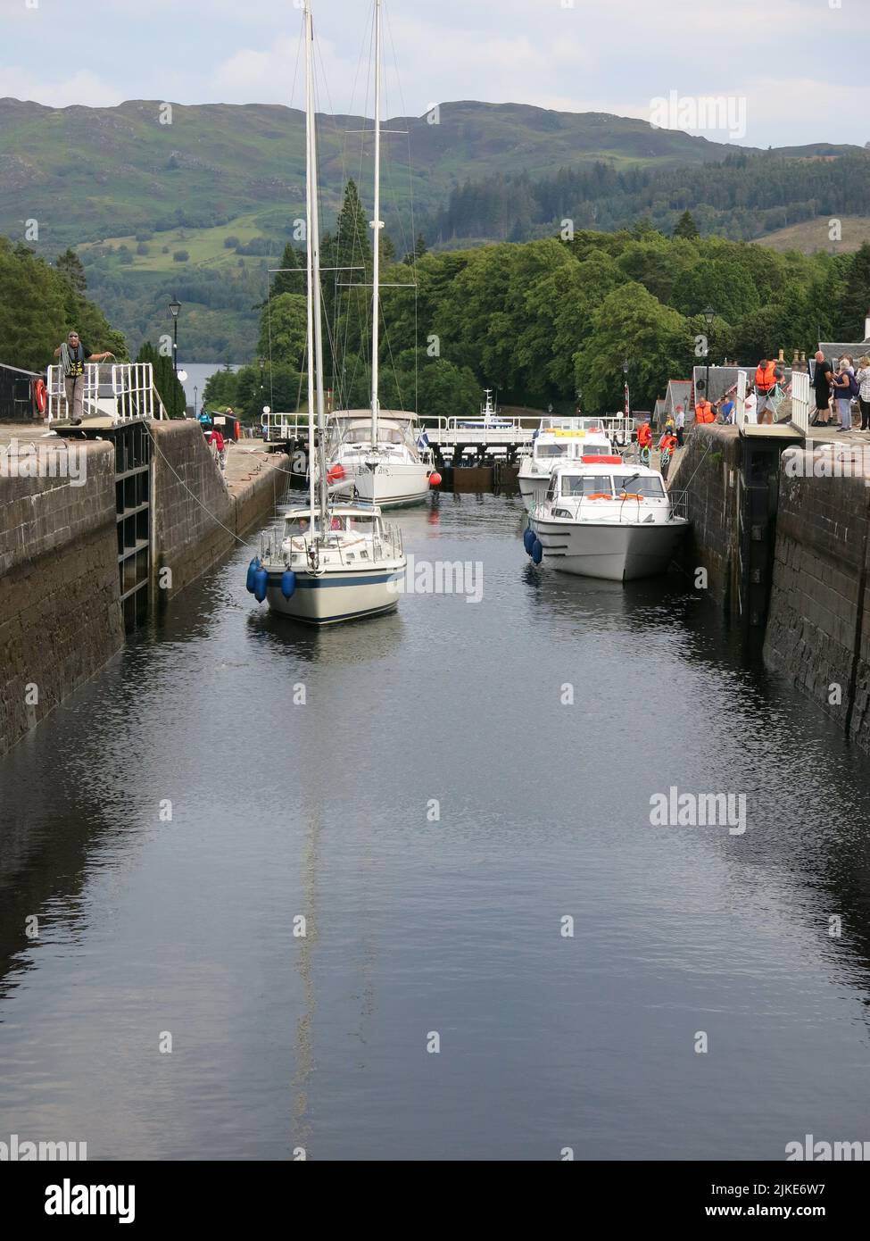 Yachts & motor cruisers work their way through the series of locks from ...