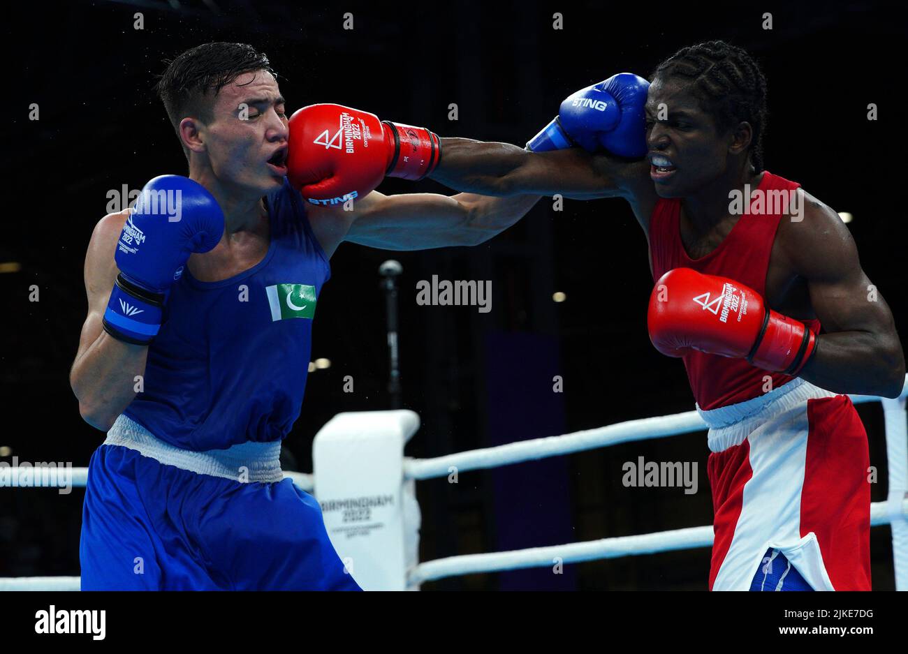 Trinidad and Tobago's Shawn Anthony Joseph (Red) and Pakistan's llyas ...