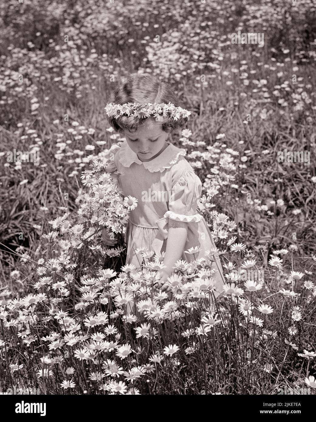 Children with flowers 1950s hi-res stock photography and images - Alamy