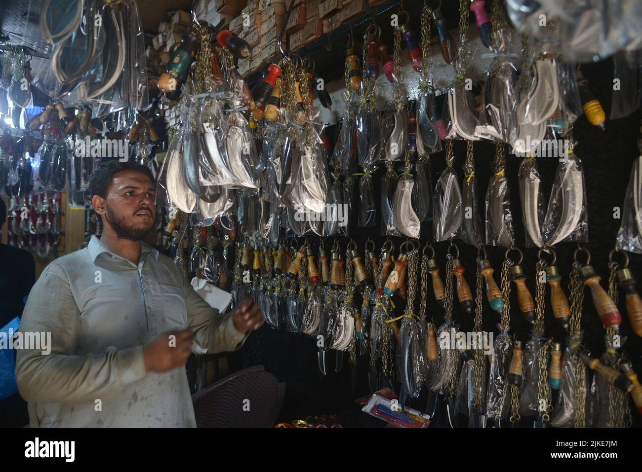 Lahore, Pakistan. 01st Aug, 2022. Pakistani vendor displays sacred ...