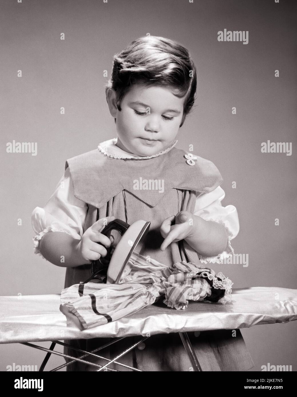 Child chores 1960s hi-res stock photography and images - Alamy