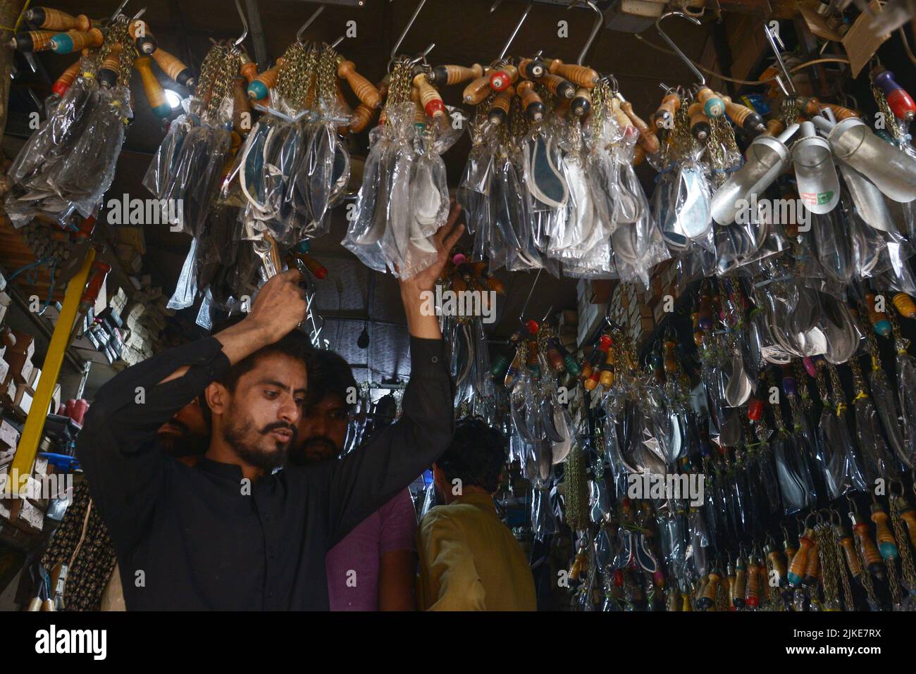 Lahore, Pakistan. 01st Aug, 2022. Pakistani vendor displays sacred ...