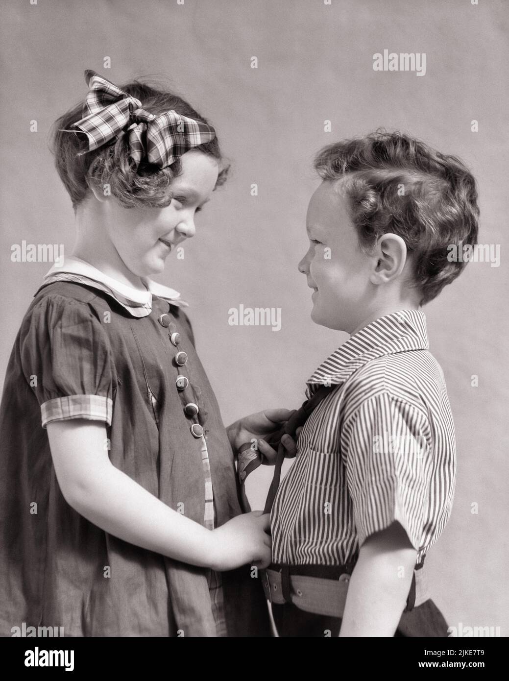 Girl and boy helping older person hi-res stock photography and images ...