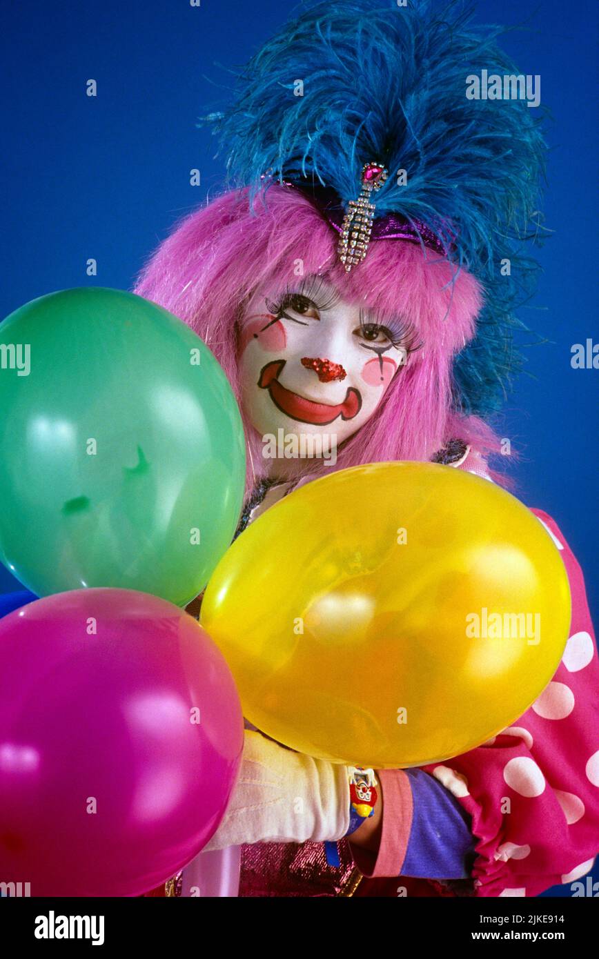 1990s LADY CLOWN WITH BALLOONS PAINTED FACE PINK HAIR BIG BLUE FEATHER ...