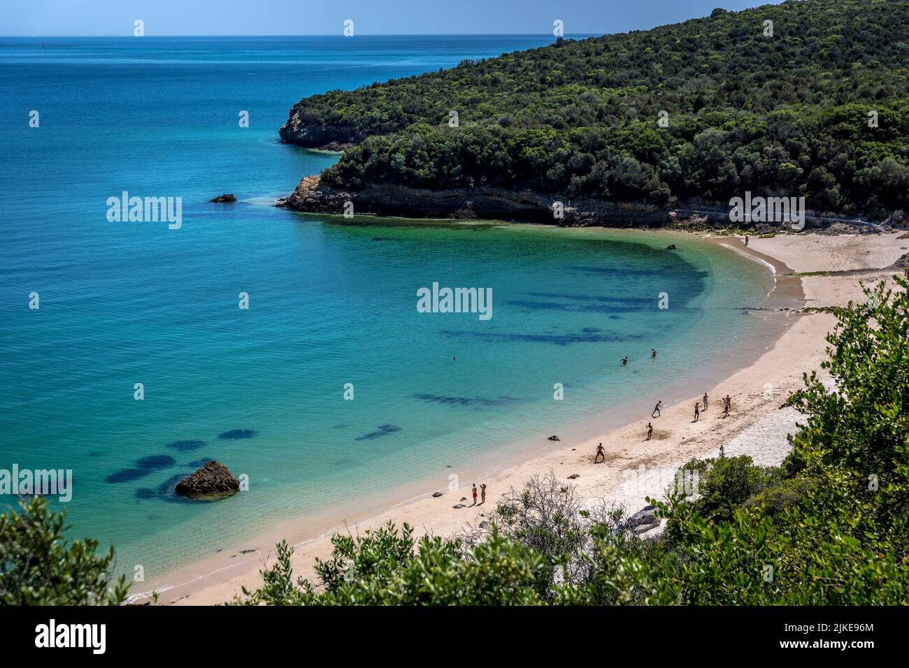 People enjoying an amazing beach in Setubal area Stock Photo - Alamy