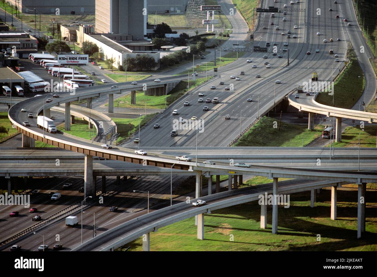 1980s AUTOMOBILE TRAFFIC ON SUPER HIGHWAYS OVER UNDER ON AND OFF RAMPS ...