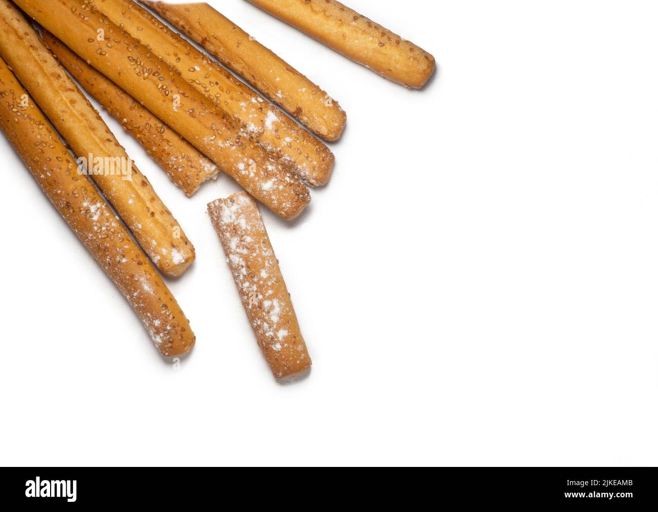 Sesame biscuits on a white background. Biscuits are elongated in the ...