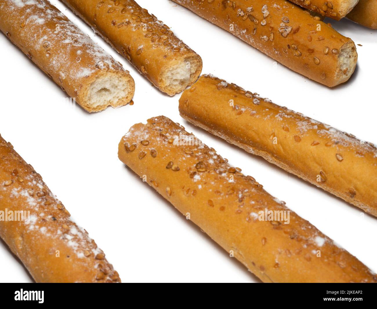Sesame biscuits on a white background. Biscuits are elongated in the ...