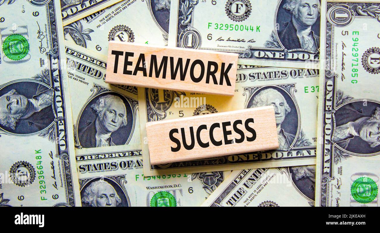 Teamwork success symbol. Concept words Teamwork success on wooden ...