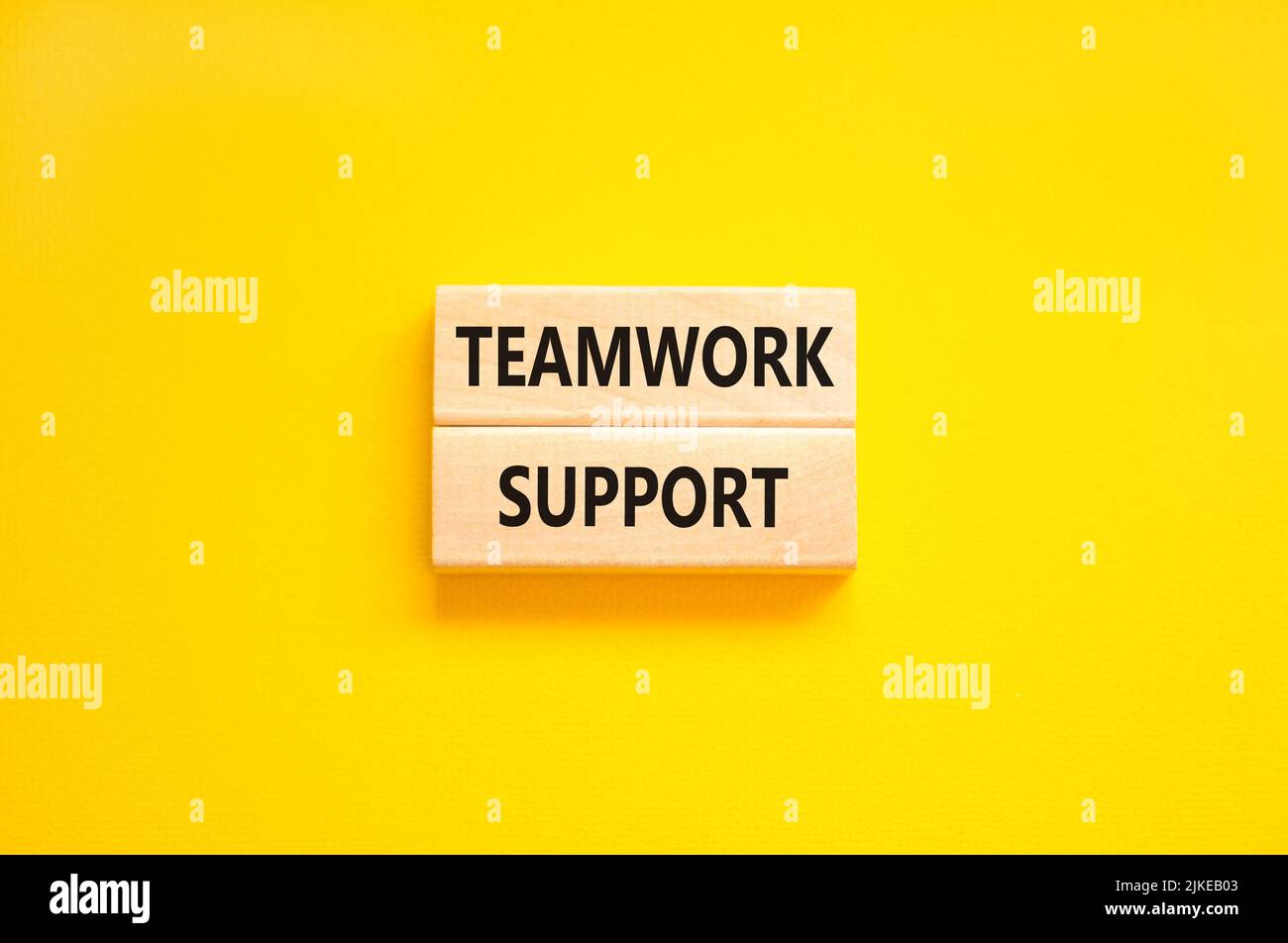 Teamwork support symbol. Concept words Teamwork support on wooden ...