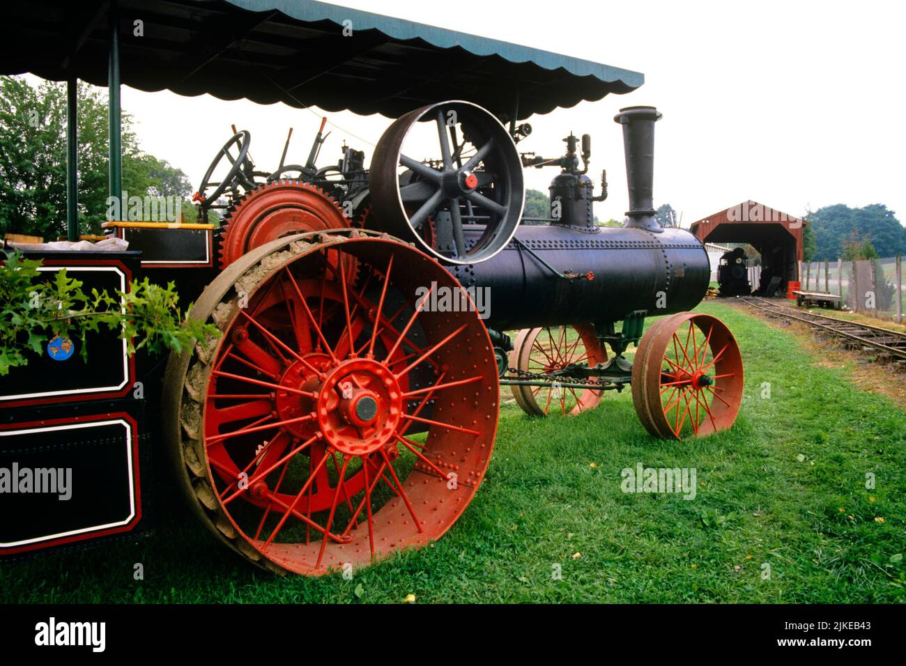 1990s CIRCA 1900 STEAM TRACTION ENGINE FARM TRACTOR MACHINE AT ROUGH ...