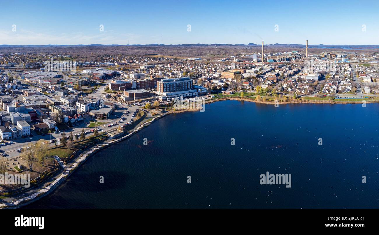 Aerial view of Rouyn-Noranda City and Osisko Lake in a fall season sunny day. Abitibi ...
