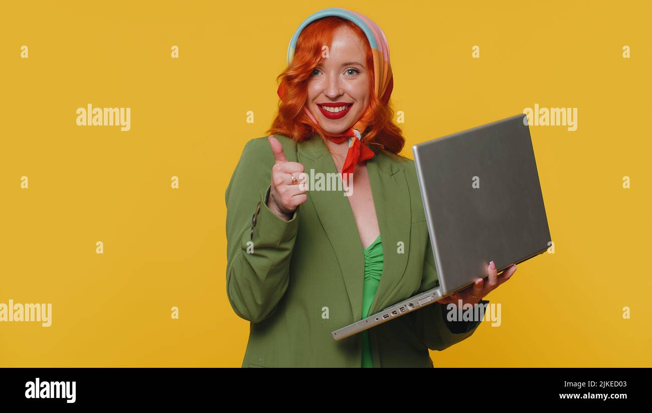 Redhead Young Woman Working Online On Laptop Finishing Work Showing