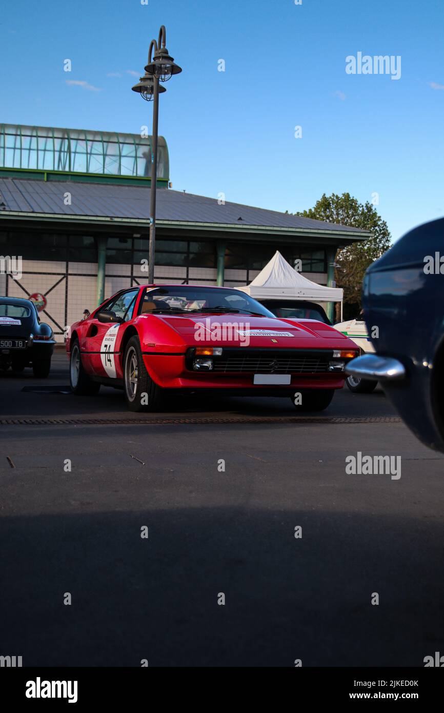 A vertical shot of a Ferrari 308 GTB car during the Rallye des ...